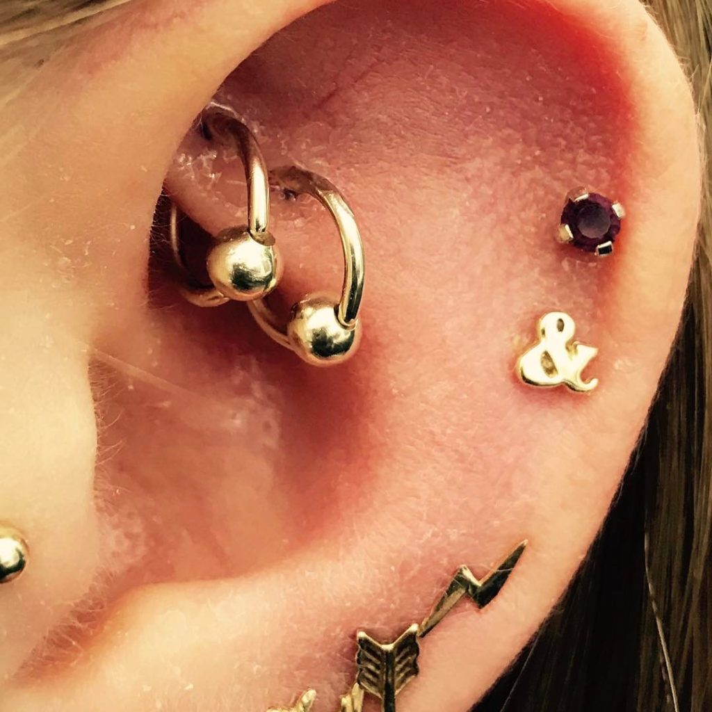 Fresh double rook piercings done today ⋆ Studio XIII Gallery