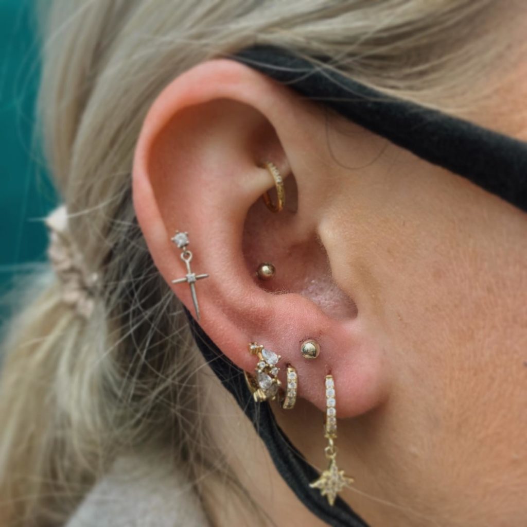 Ear goals! This lovely had a three existing lobe piercings and she ...