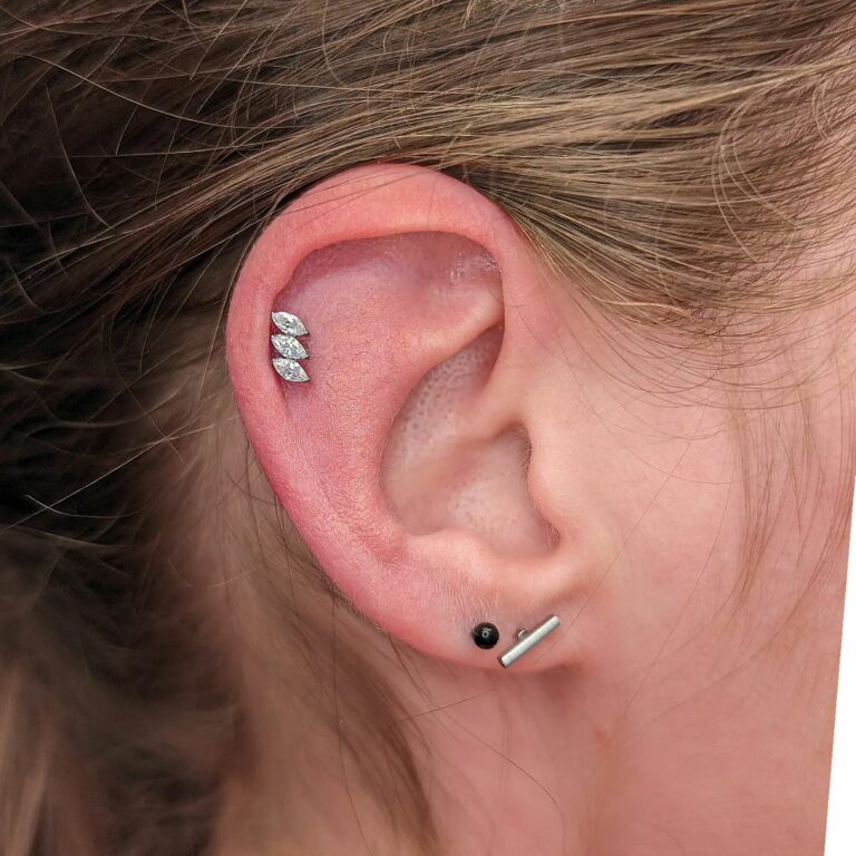 A simple helix piercing made super fancy. Pierced with our triple ...